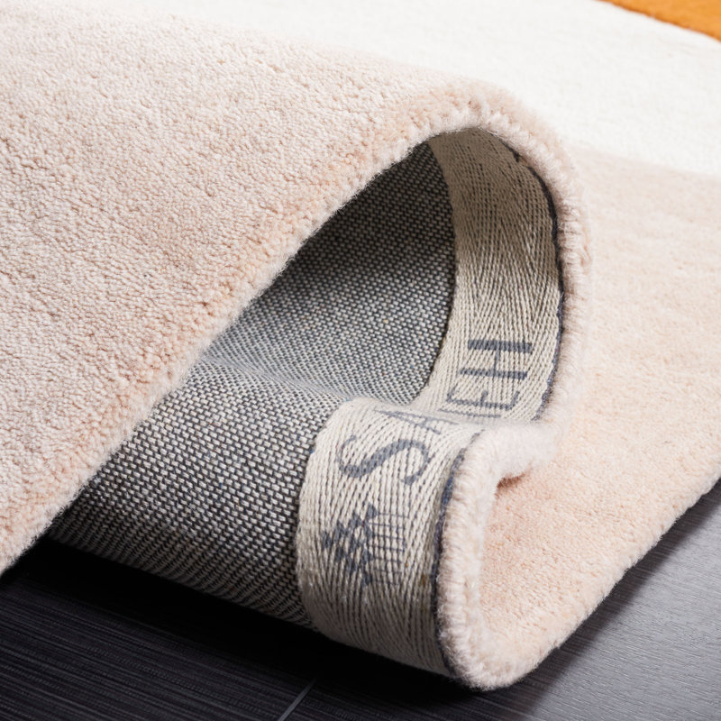 AllModern Felipe Handmade Wool Ivory / Rust Rug & Reviews | Wayfair