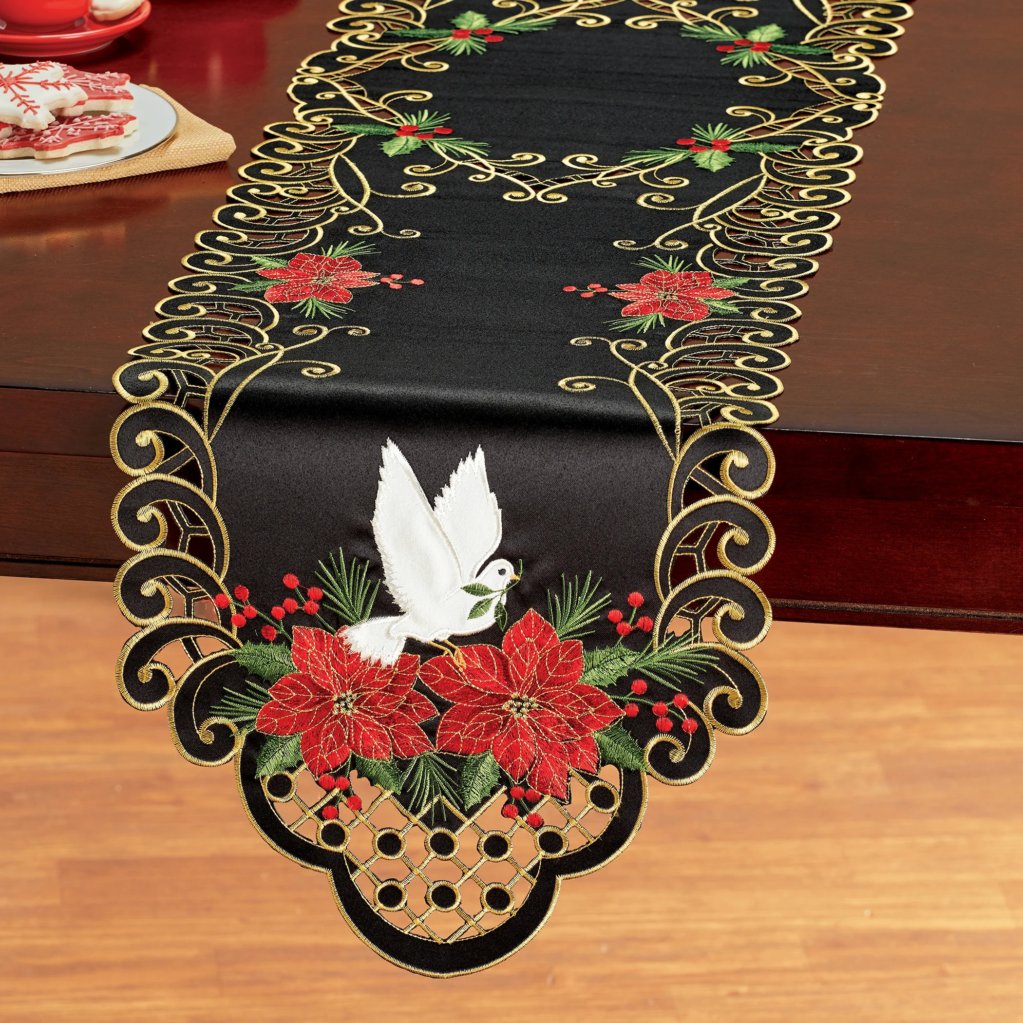 The Holiday Aisle® Holiday Poinsettia Dove Cut-Out Table Linens | Wayfair