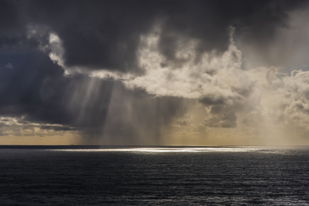 Highland Dunes Rain Falls In The Distance Off The Coast; Oregon United ...