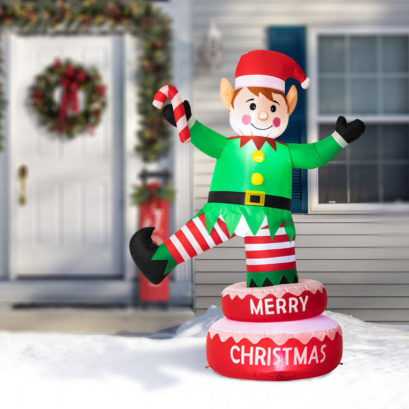 The Holiday Aisle® 6FT Lighted Inflatable Rotating Elf Decor | Wayfair