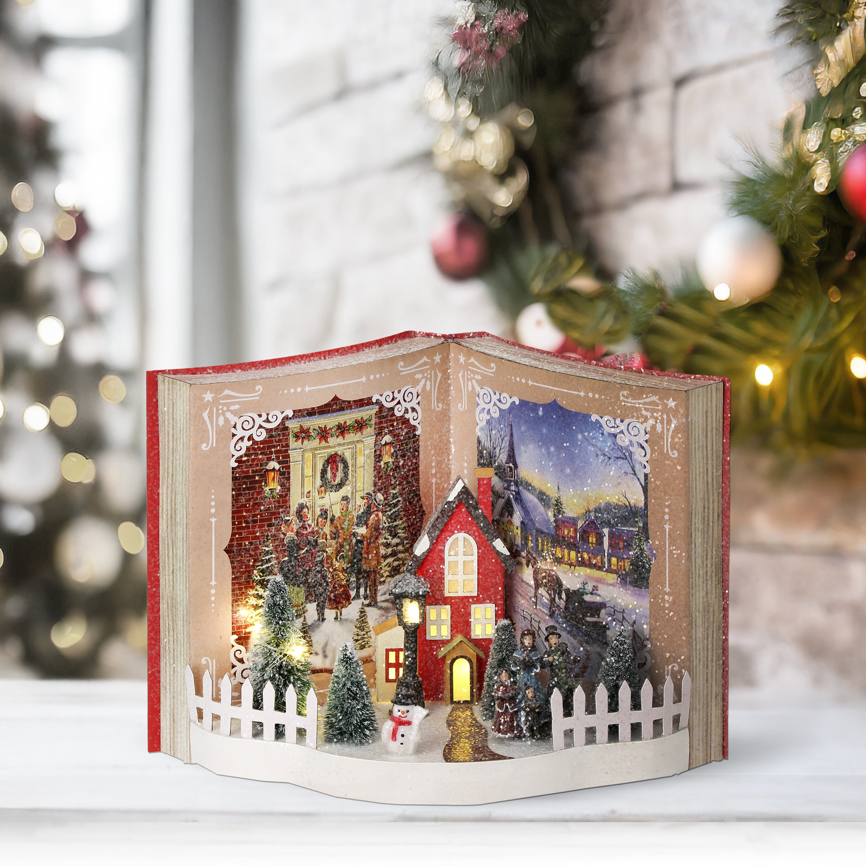 The Holiday Aisle® 11.5" Led Village Caroling Storybook | Wayfair