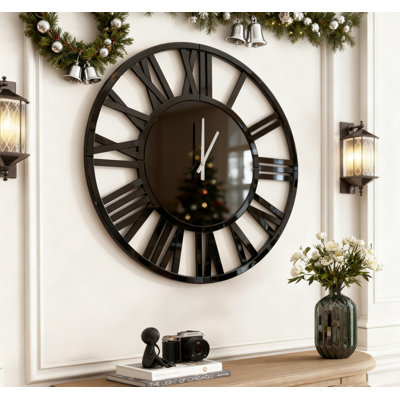 black mirrored skeleton clock