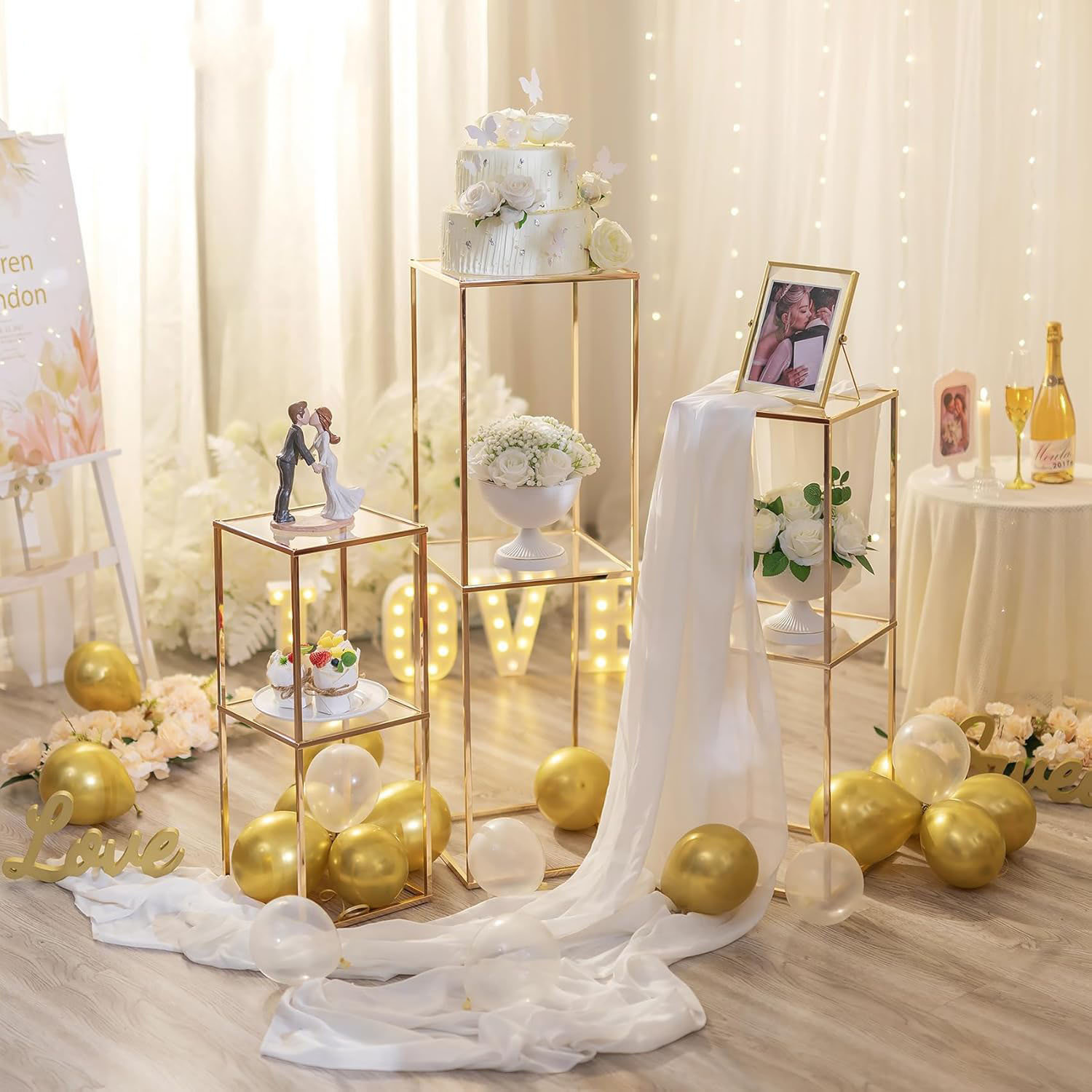 Everly Quinn These are gold - toned metal frame display stands with ...