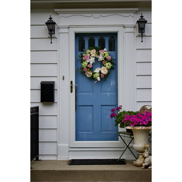 17 Stories Blue Door Decorated With A Wreath by Cynthia Shirk - Wrapped ...