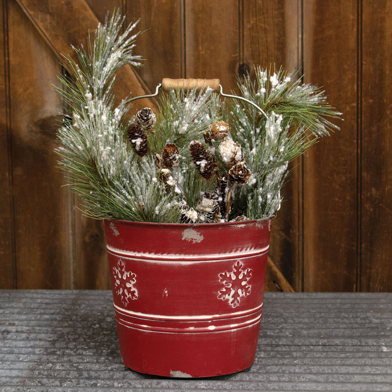 The Holiday Aisle® Distressed Red Metal Snowflake Embossed Bucket | Wayfair