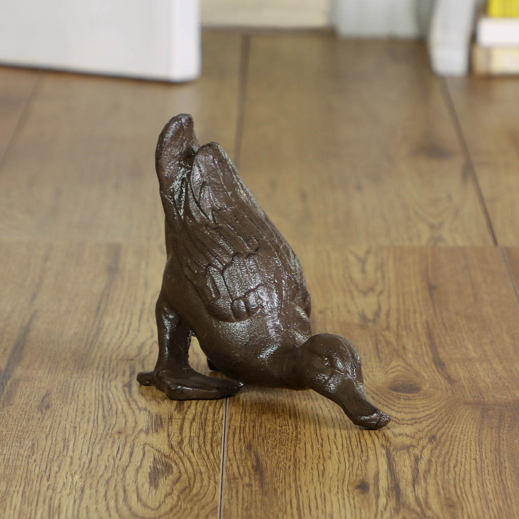 Marlow Home Co. Boatright Diving Duck Iron Floor Door Stop | Wayfair.co.uk