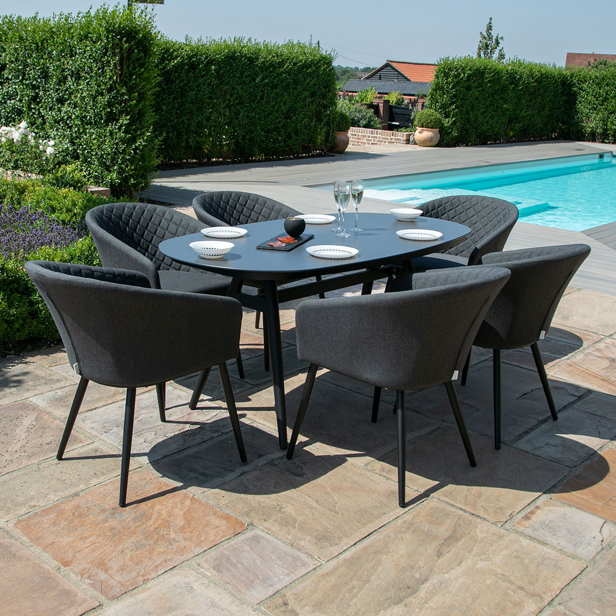 Ebern Designs Sladkowski Outdoor Fabric 6 Seat Oval Dining Set | Wayfair.ie