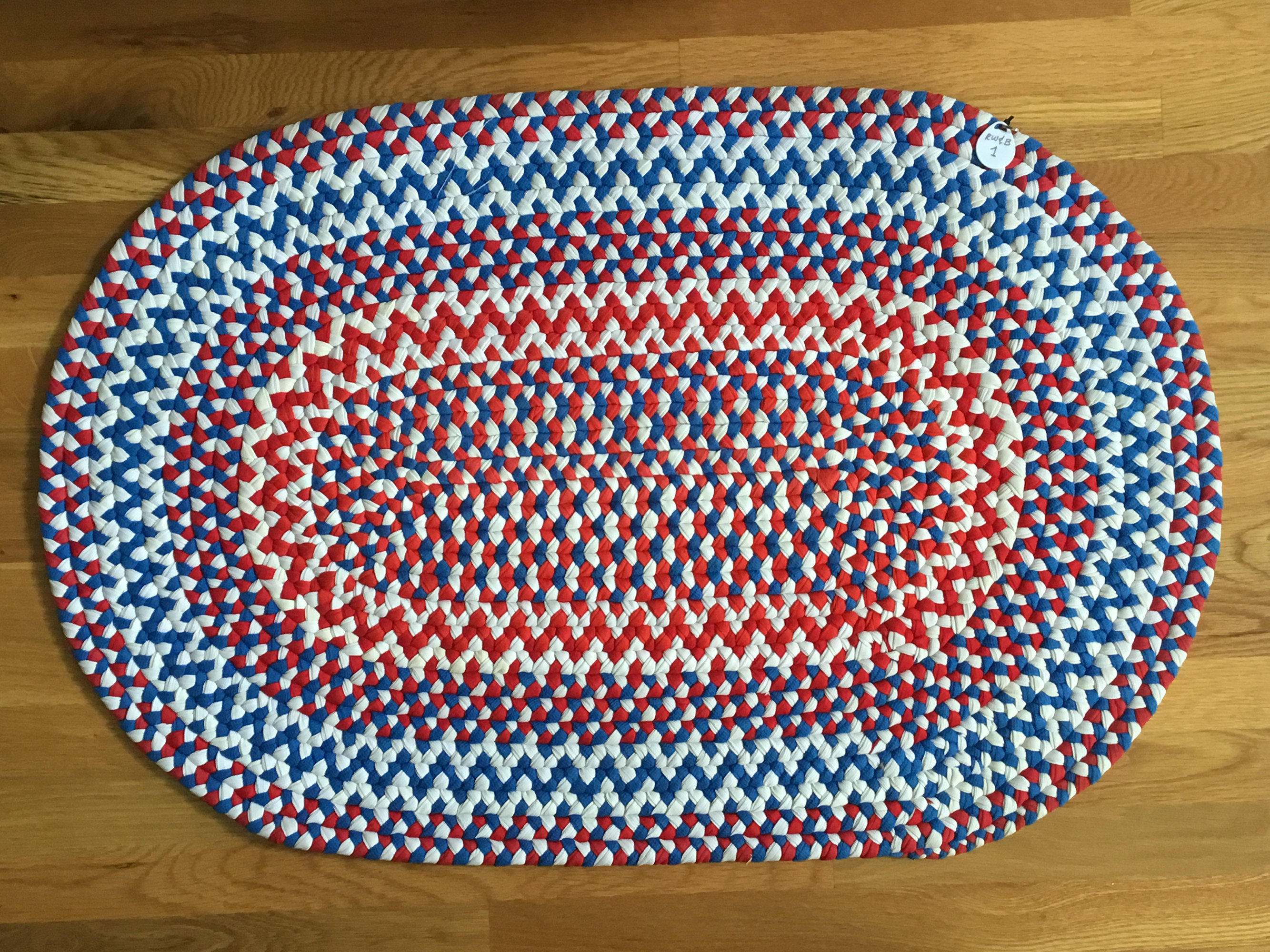 August Grove® Oval Forcella Hand Braided Red Area Rug | Wayfair