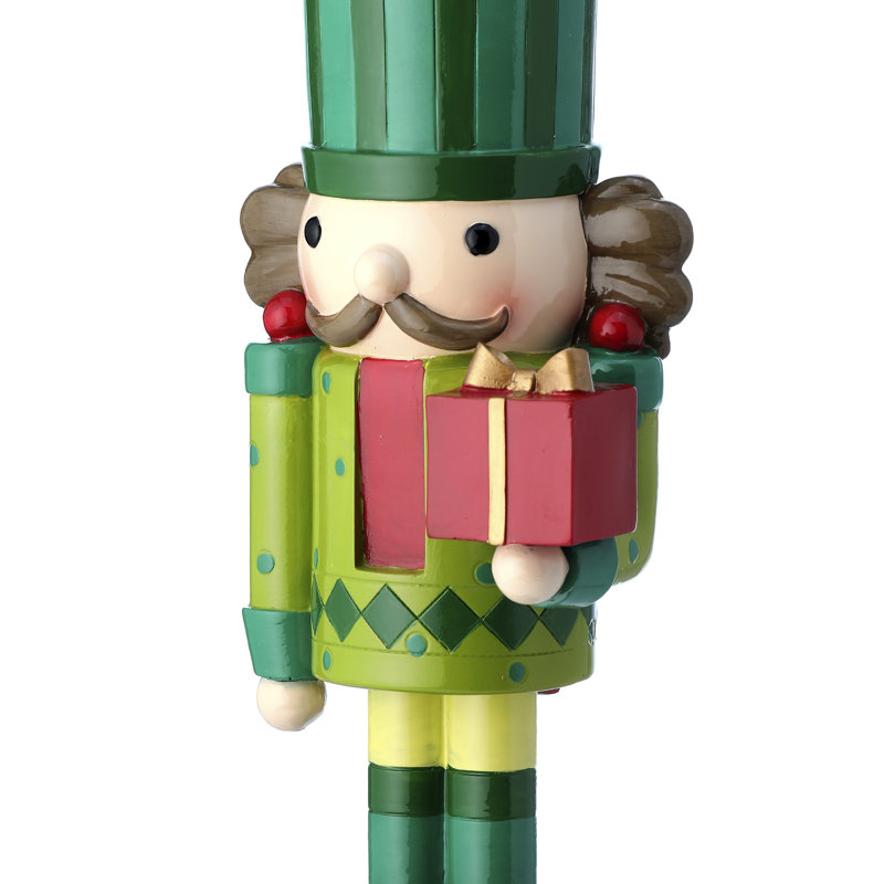 The Holiday Aisle® 12" Resin Nutcracker With Package | Wayfair