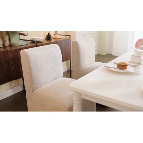 Ebern Designs Ritney Down Fill Modern Dining Chairs Casters Parsons ...