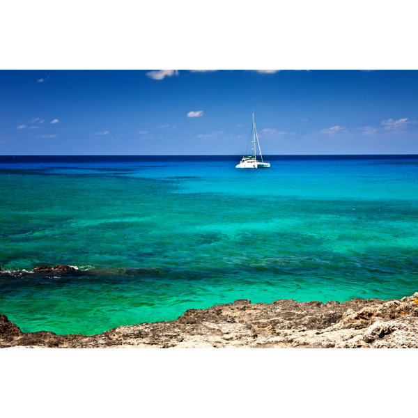 Breakwater Bay Yacht Floats Cayman Islands by Ruth Peterkin - Wrapped ...