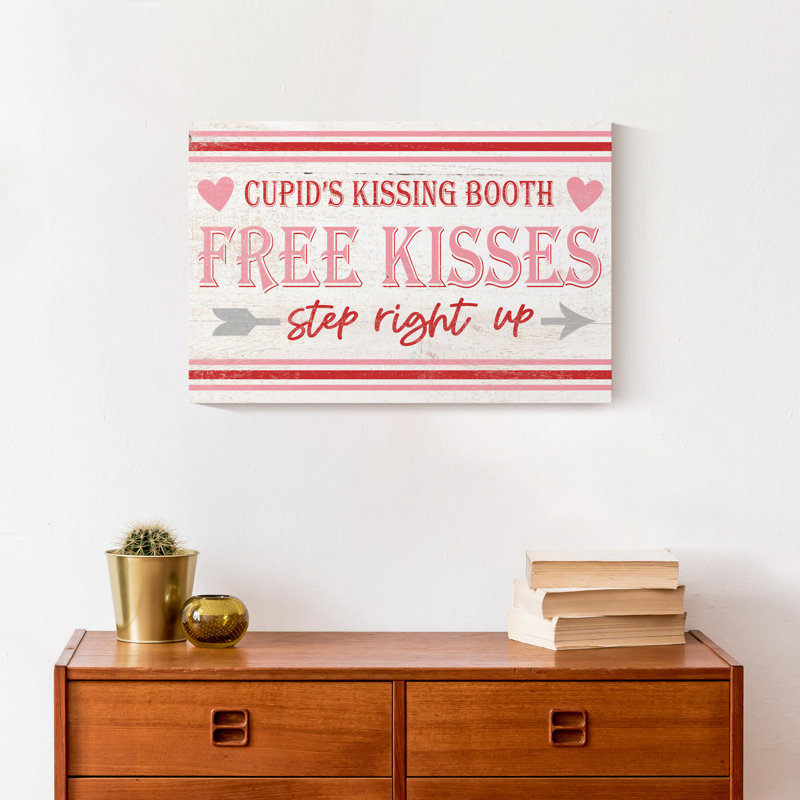 The Holiday Aisle® Cupid Kissing Booth Print On Canvas | Wayfair