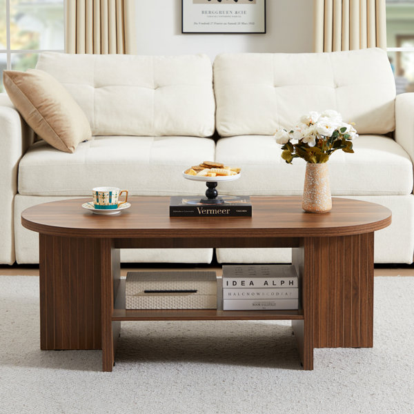 Ebern Designs 43.31'' Oval Shaped Coffee Table With Storage | Wayfair