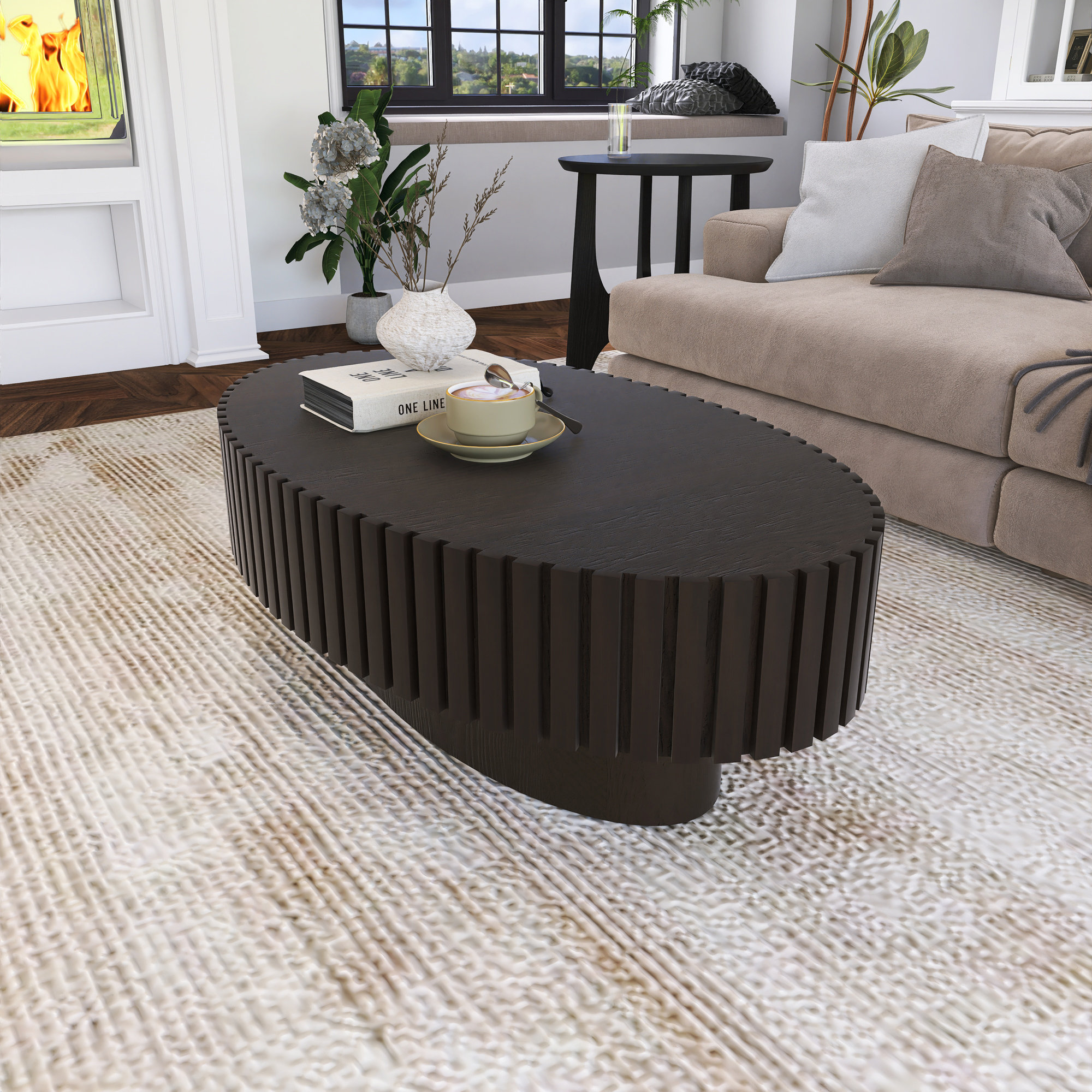 Latitude Run® Handcrafted Relief Oval Coffee Table | Wayfair