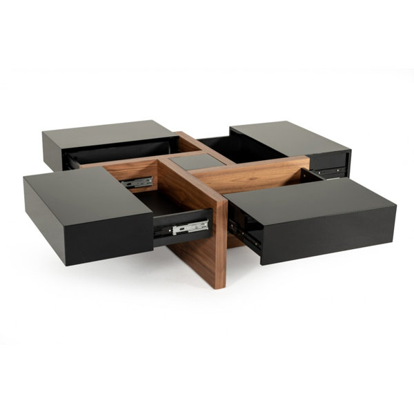 Wade Logan Bohi Solid Wood Sled Coffee Table with Storage & Reviews ...