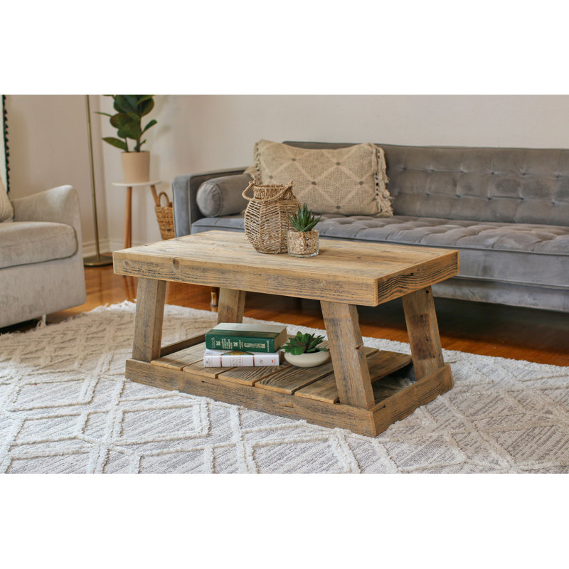 Millwood Pines Deshanda Solid Wood Floor Shelf Coffee Table with ...