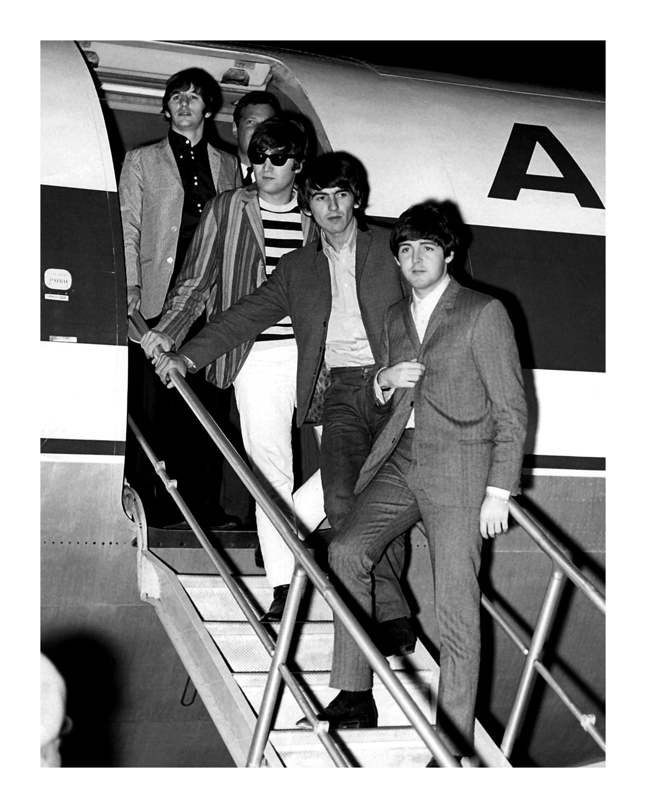 Globe Photos Entertainment The Beatles Arriving On Paper Print | Wayfair
