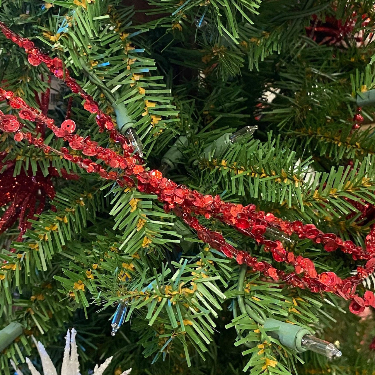 The Holiday Aisle® Red Holiday Sequins Garland | Wayfair