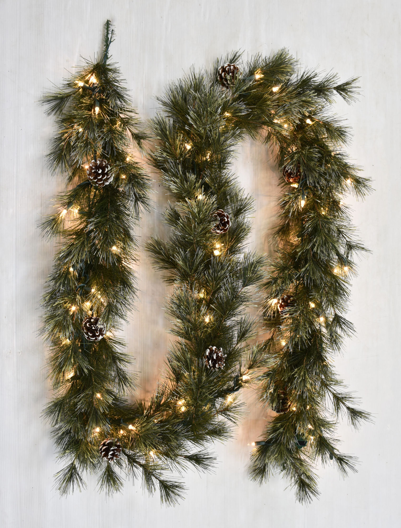 The Holiday Aisle® Hanrui 16'' in. Lighted Faux Pine Garland | Wayfair