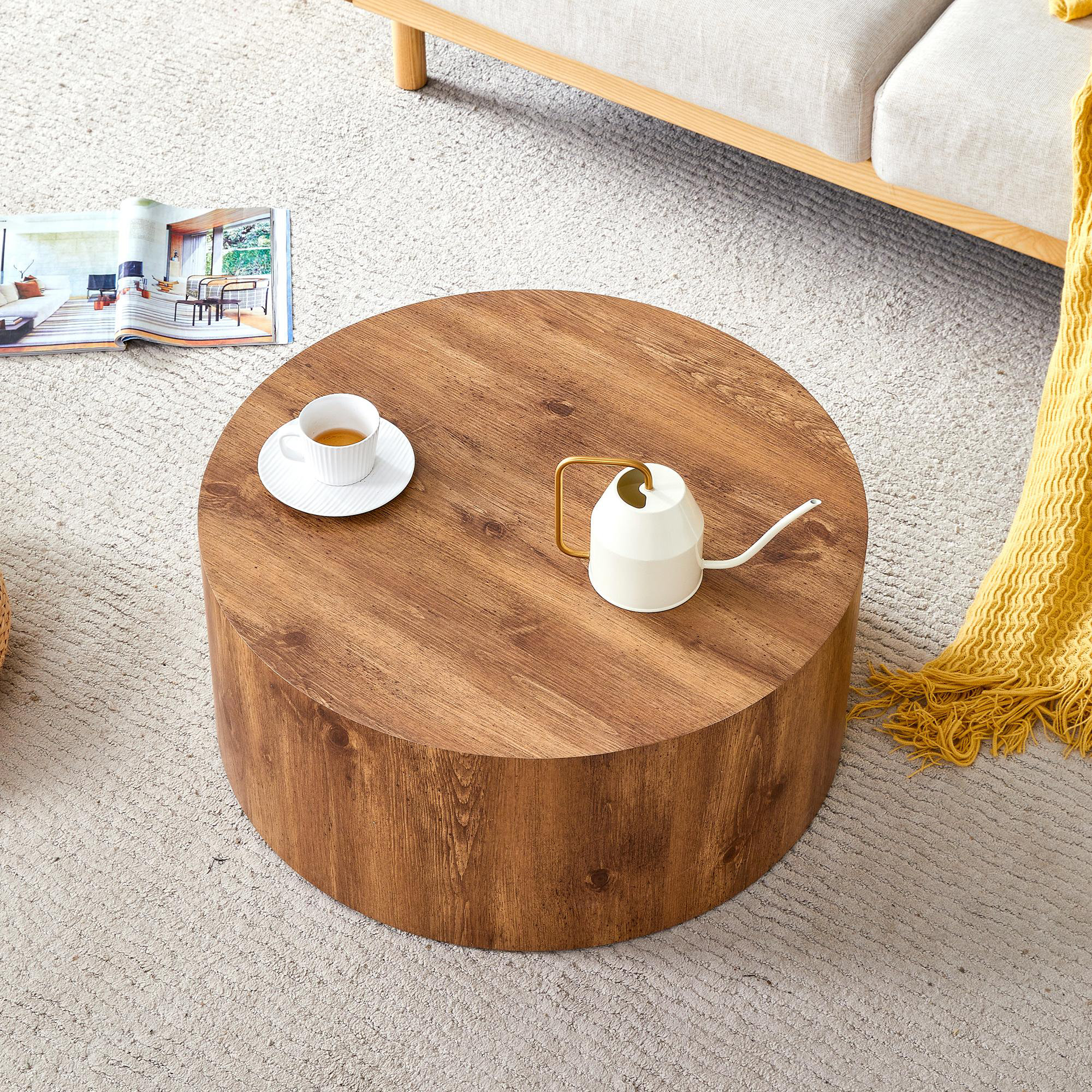 George Oliver The cylindrical table with its patterned design can be ...