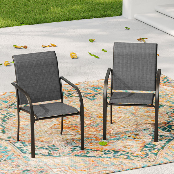 Winston Porter Oligert Outdoor Stacking Dining Armchair & Reviews | Wayfair