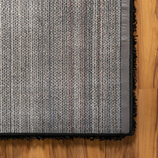 Ebern Designs Santoshi Performance Jet Black Rug & Reviews | Wayfair