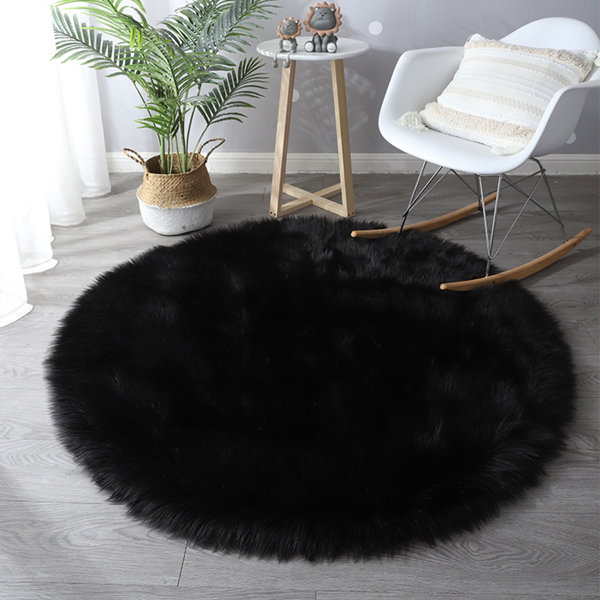 Everly Quinn Handmade Shag Faux Sheepskin Black Area Rug & Reviews ...
