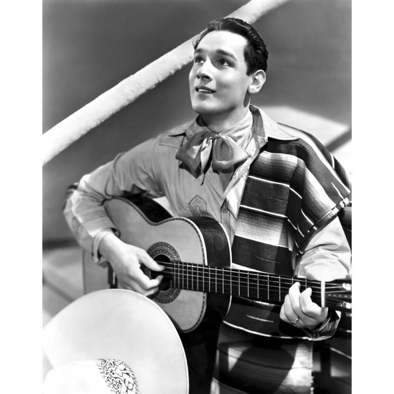 Globe Photos Entertainment & Media Tito Guizar Playing Guitar ...