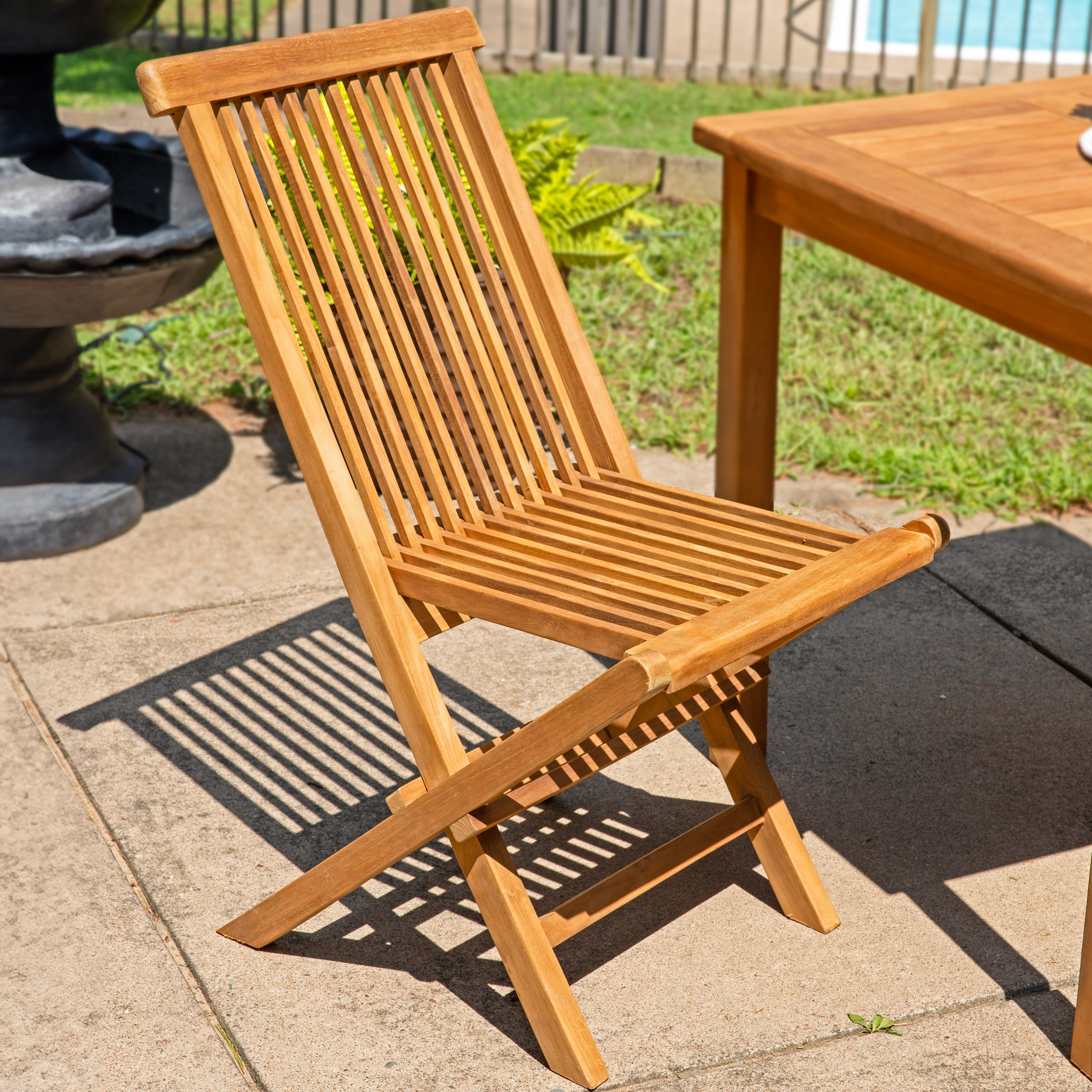 Rosecliff Heights Heitman Folding Teak Patio Dining Side Chair | Wayfair