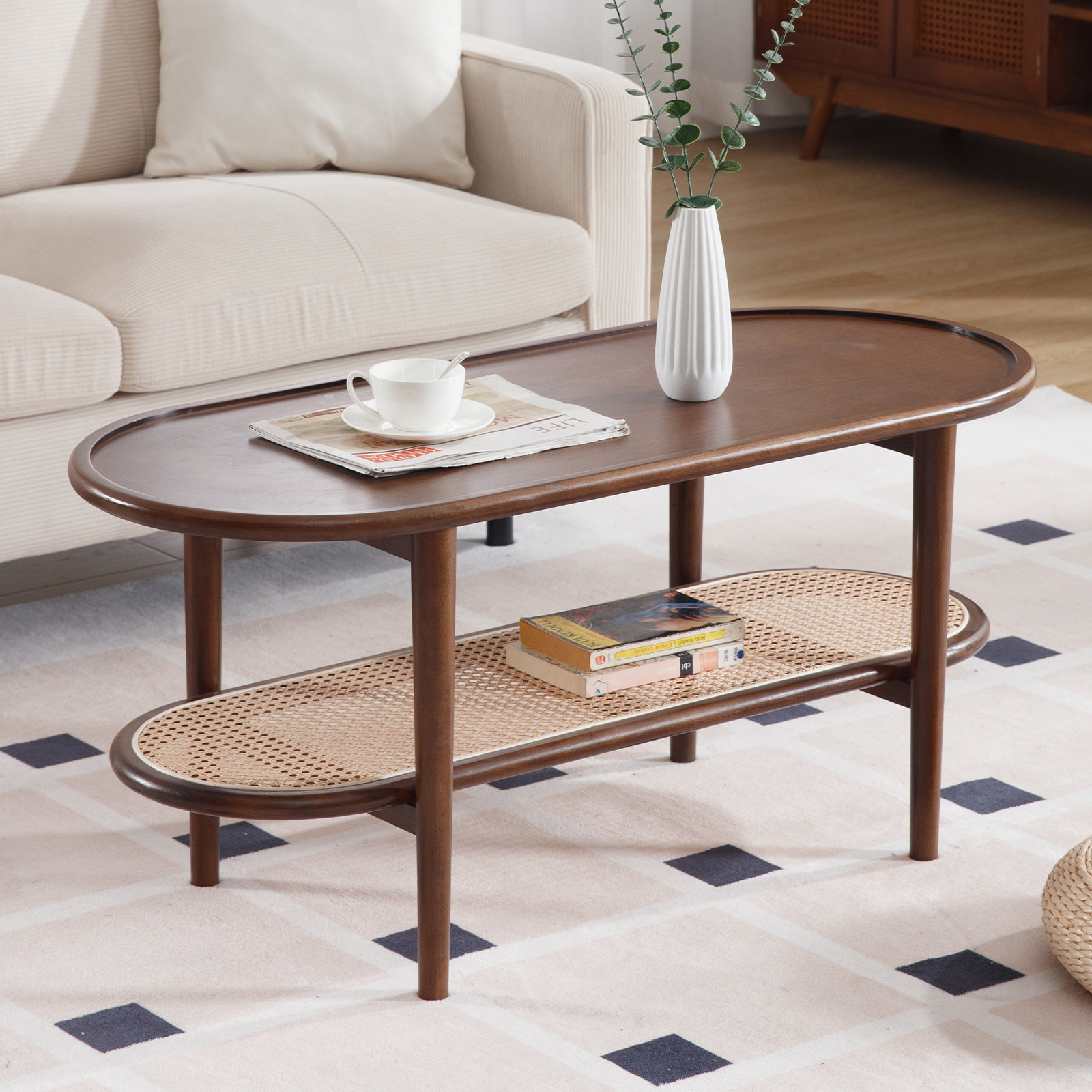 Bay Isle Home™ Arzate Solid Wood Oval Coffee Table with Rattan Shelf ...