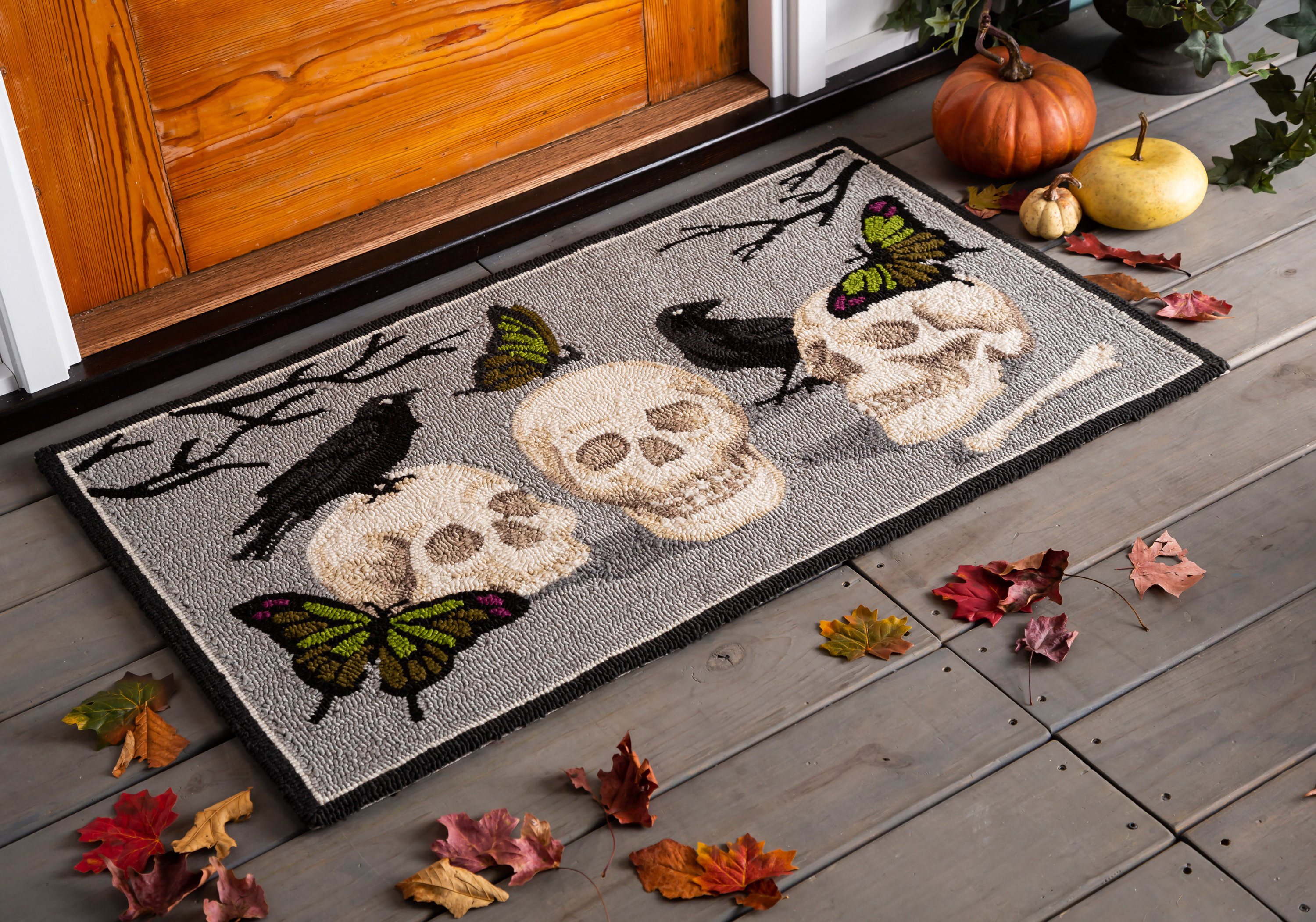 The Holiday Aisle® Trystan Skeleton and Crow 42 in. x 24 in. Non-Slip ...