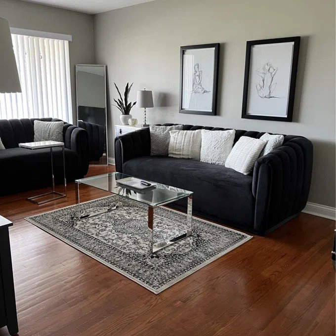 Wrought Studio™ Eugenia Glass Top Coffee Table With Sleek Sled Design ...