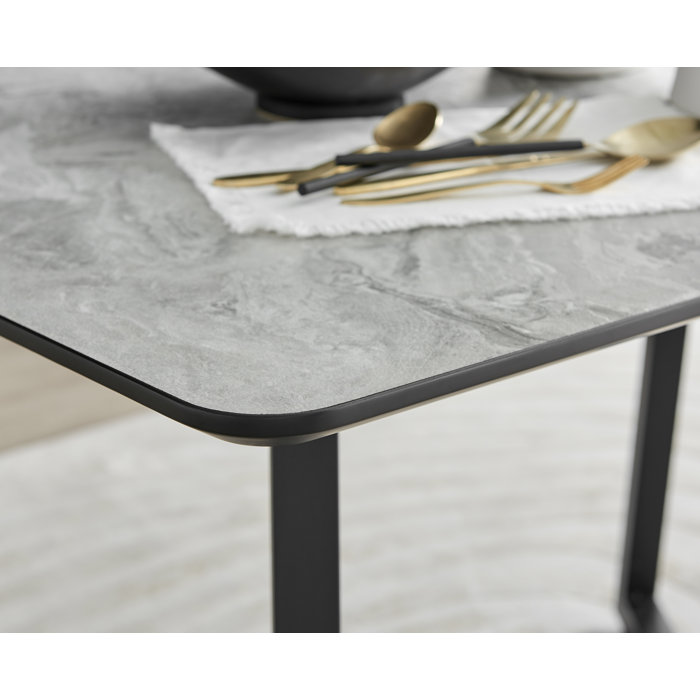 East Urban Home Carzon Marble Effect Melamine Dining Table and Chairs ...