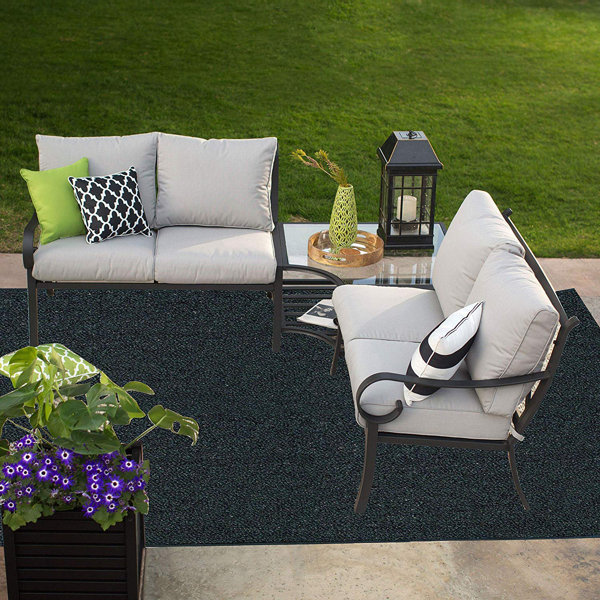 Latitude Run® Amice Solid Color Outdoor Rug | Wayfair