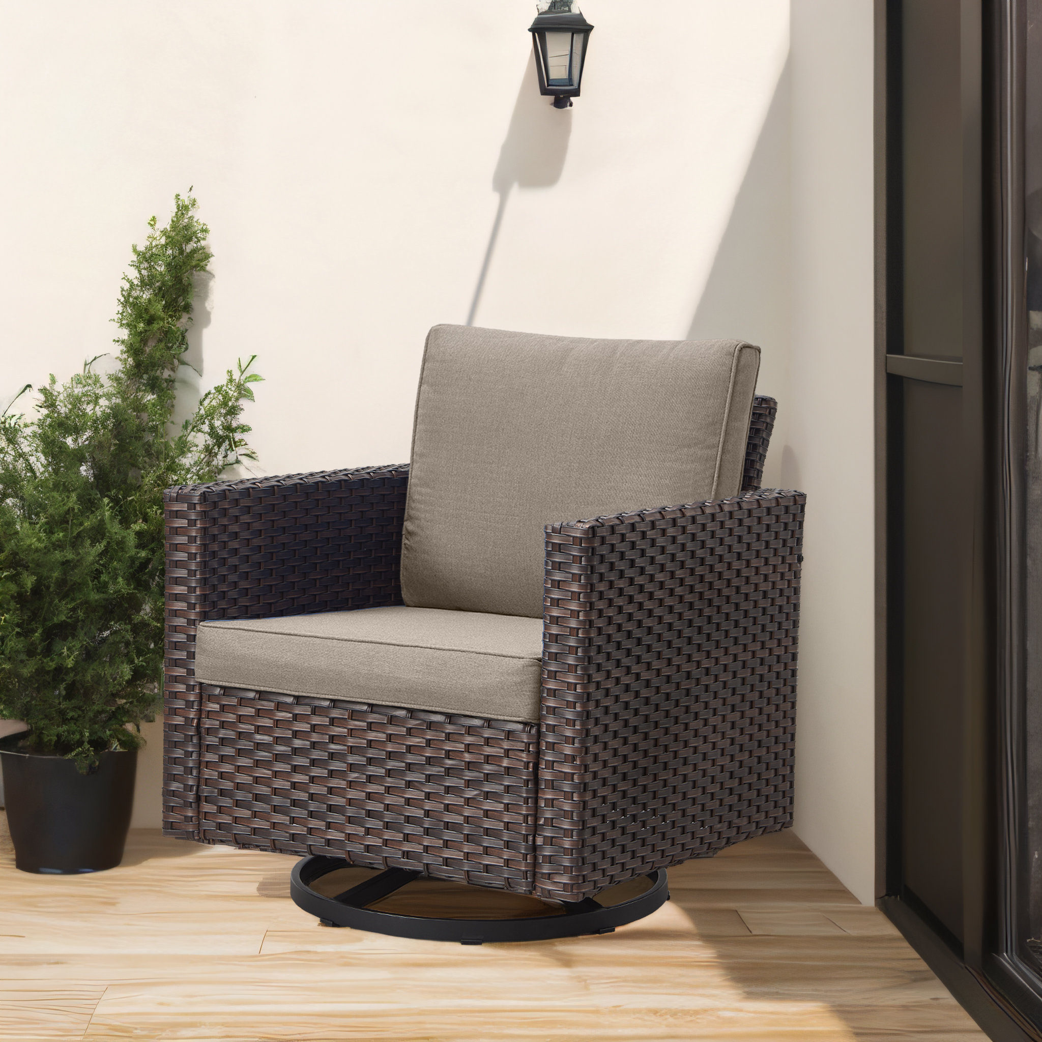 Ebern Designs Reshod Swivel and Rocking Wicker Outdoor Lounge Chair ...