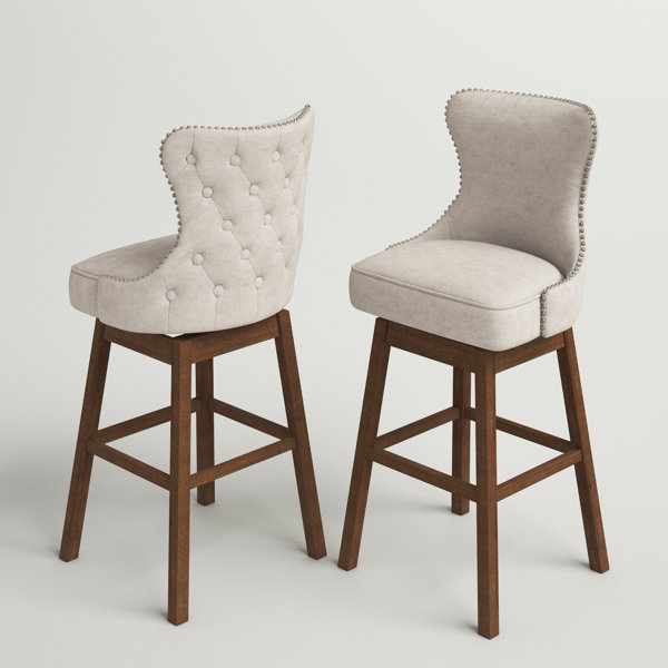 Three Posts™ Wadley Swivel Upholstered 30.51'' Counter Stool with Solid ...