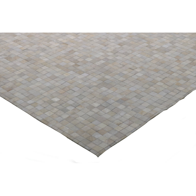 Orren Ellis Meer Patchwork Handmade Cow Skin Ivory Area Rug | Wayfair