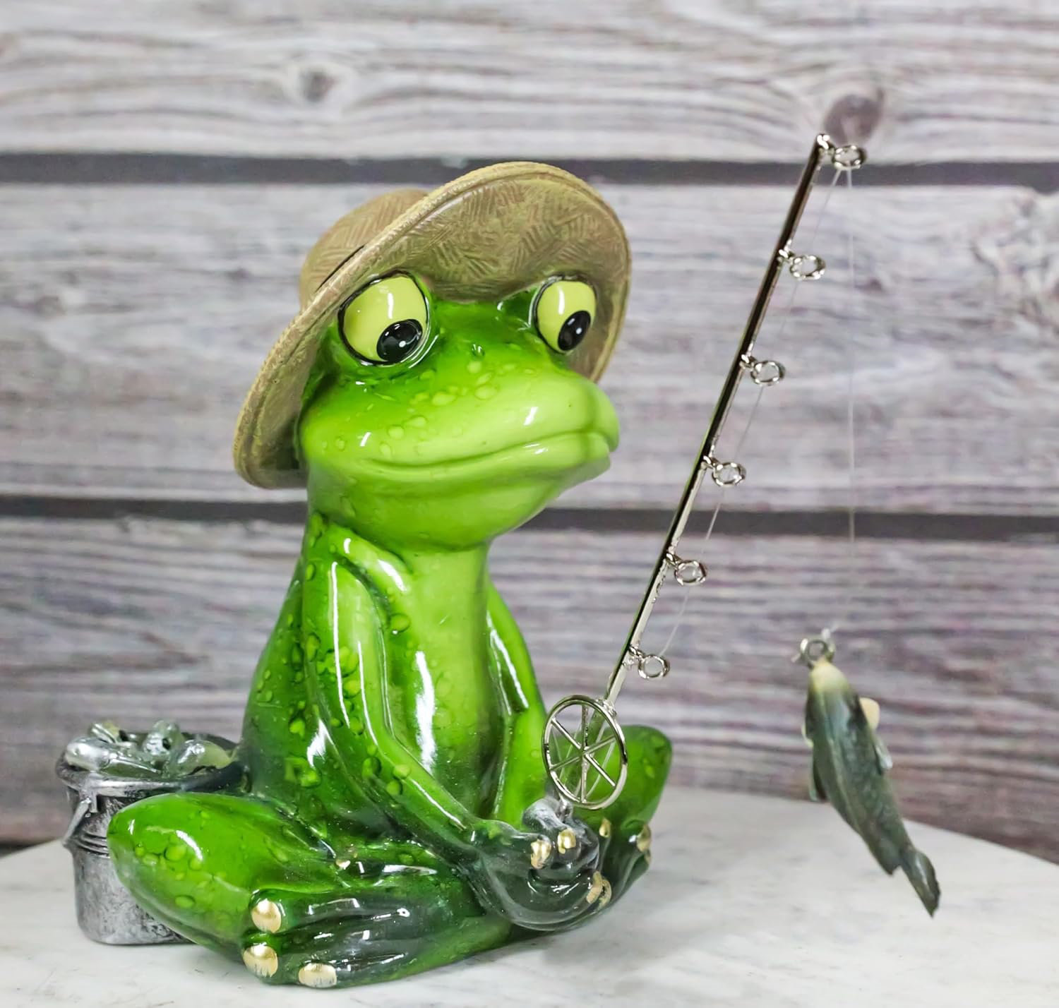 Trinx Catch Of The Day Green Frog Rod Fishing And Wearing Fisherman Hat ...