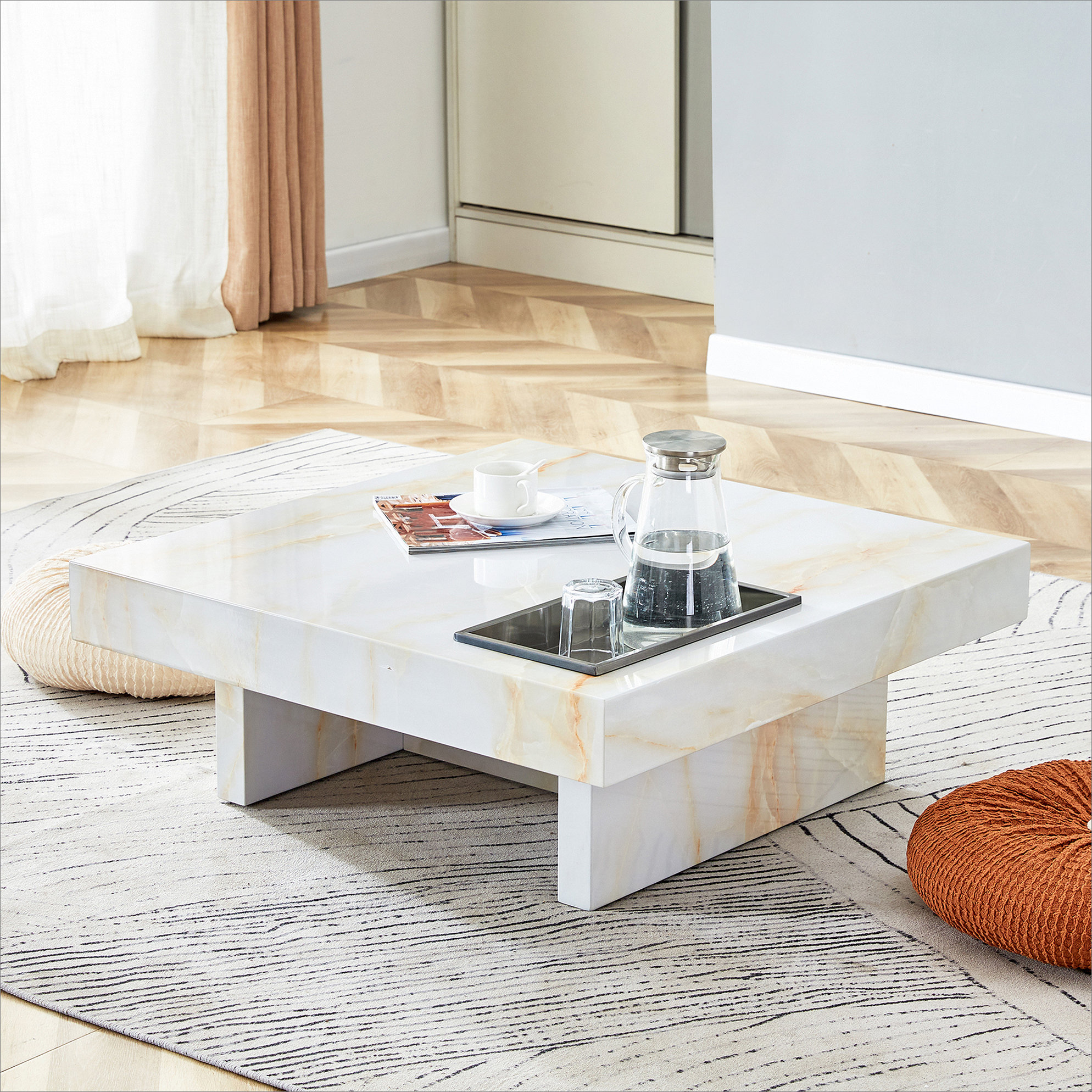 Ebern Designs A modern and practical coffee table with imitation marble ...