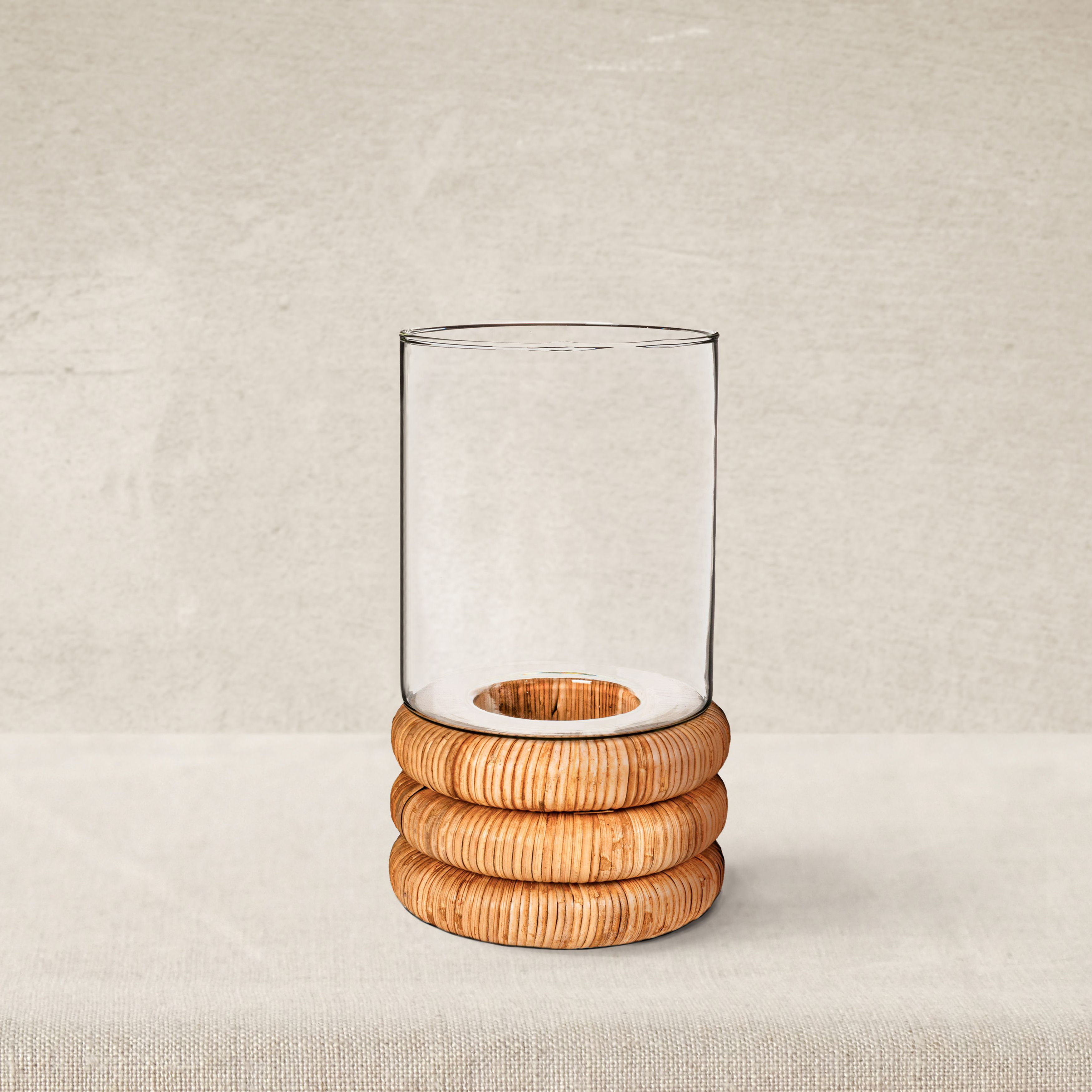 Bay Isle Home™ Glass Hurricane Vase With Woven Rattan Base, Small | Wayfair
