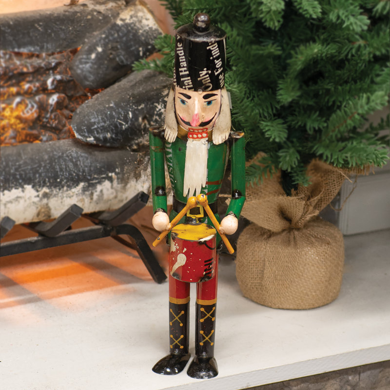 Ophelia & Co. Recycled Metal Green Nutcracker w/Drum | Wayfair