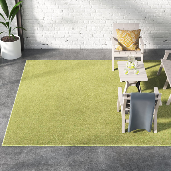 Trent Austin Design® Mullican Sandy Solid Green Easy Care Area Rug ...