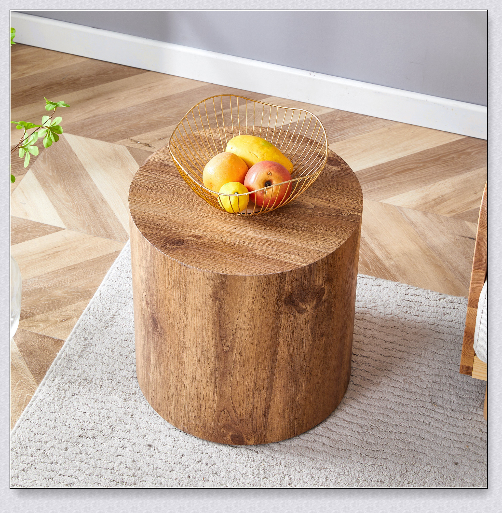 George Oliver The cylindrical table with its patterned design can be ...