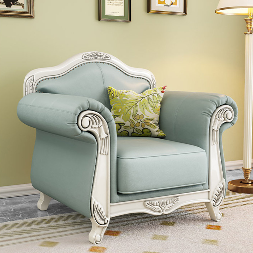 Laouteu A carved light blue leather sofa chair | Wayfair