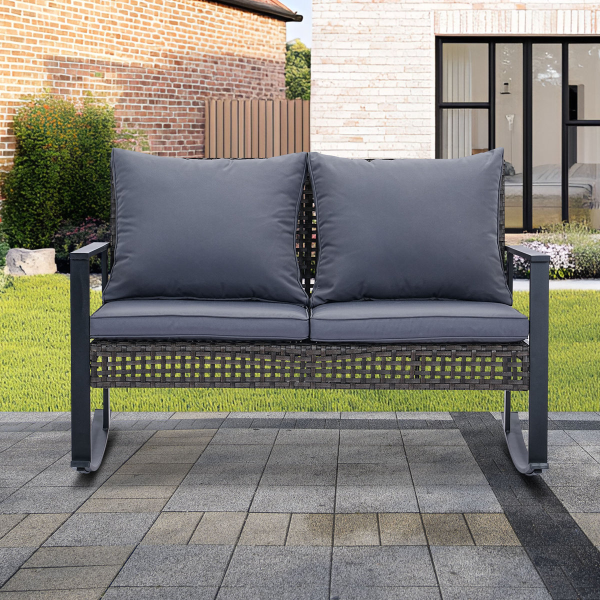 Winston Porter Outdoor rattan rocking loveseat chair | Wayfair