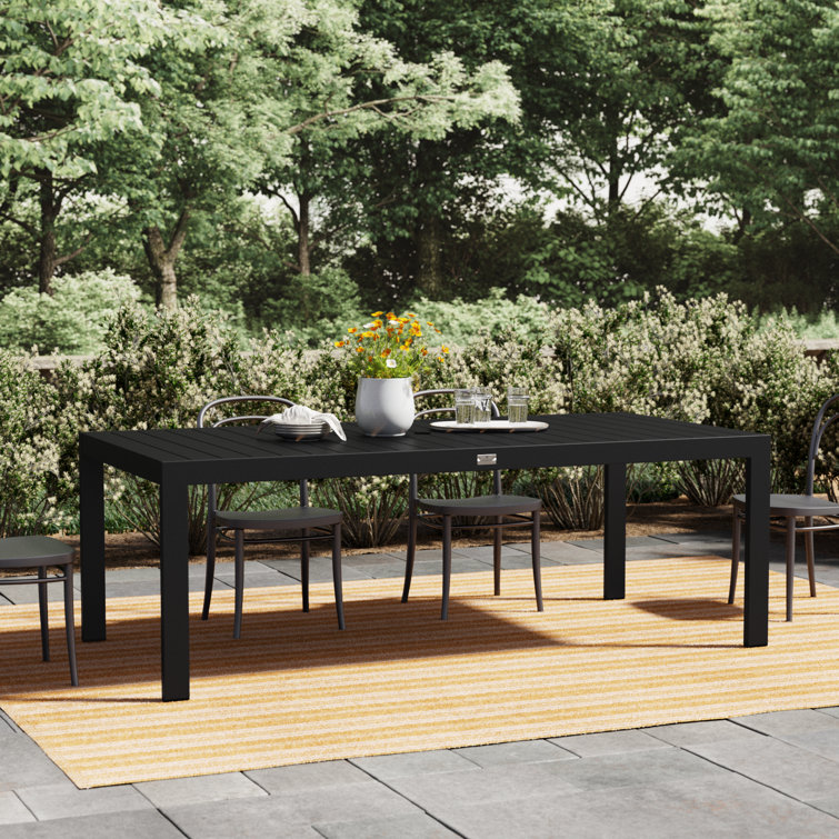 Wade Logan® Braxdyn Rectangular Metal Outdoor Dining Table & Reviews ...
