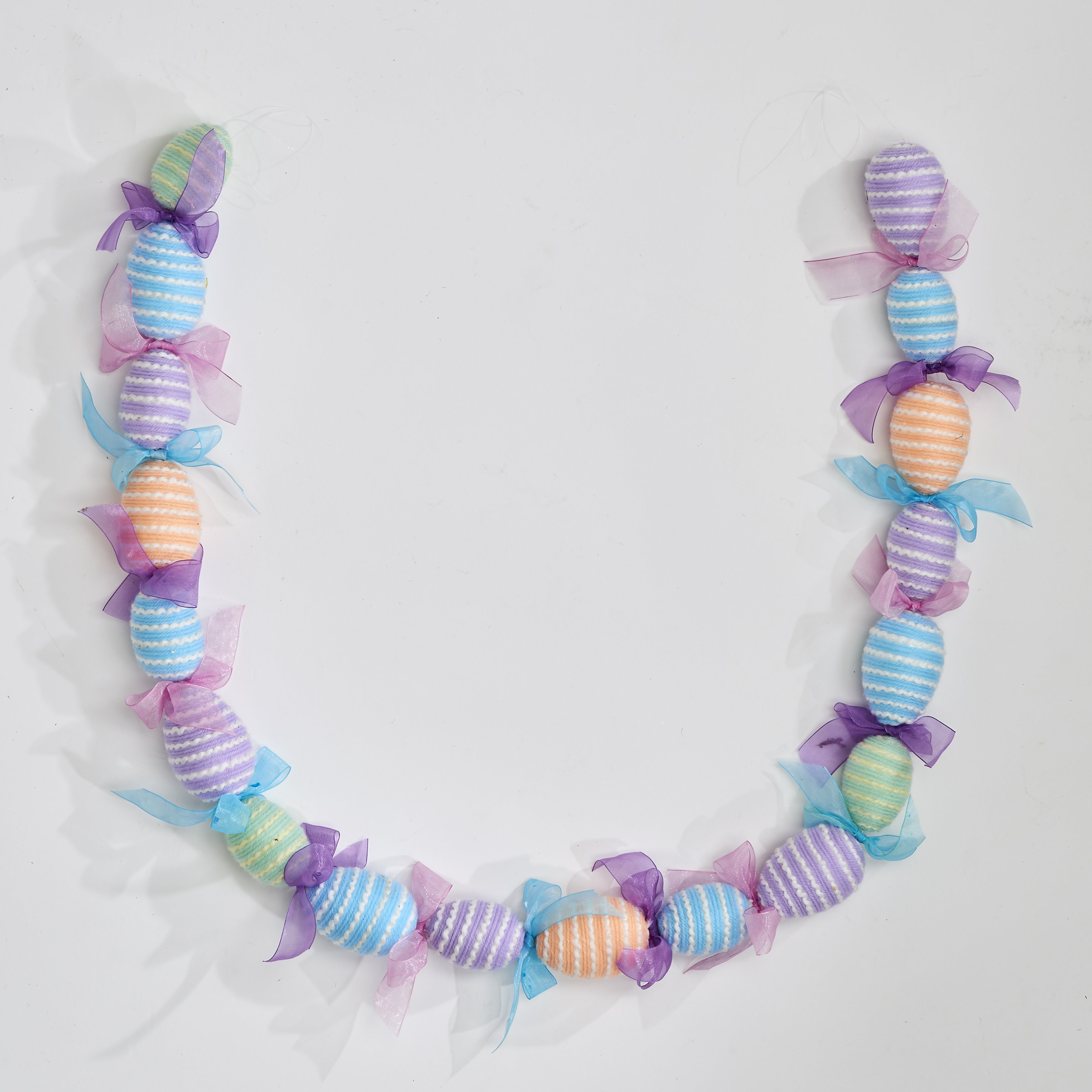 The Holiday Aisle® 4' Easter Garland with Yarn Covered Eggs & Organza ...