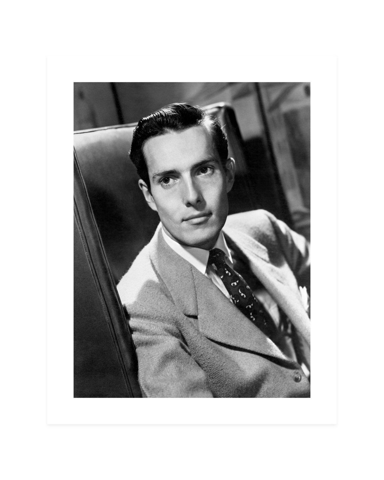 Globe Photos Entertainment Thoughtful Hurd Hatfield Sitting On Chair On ...