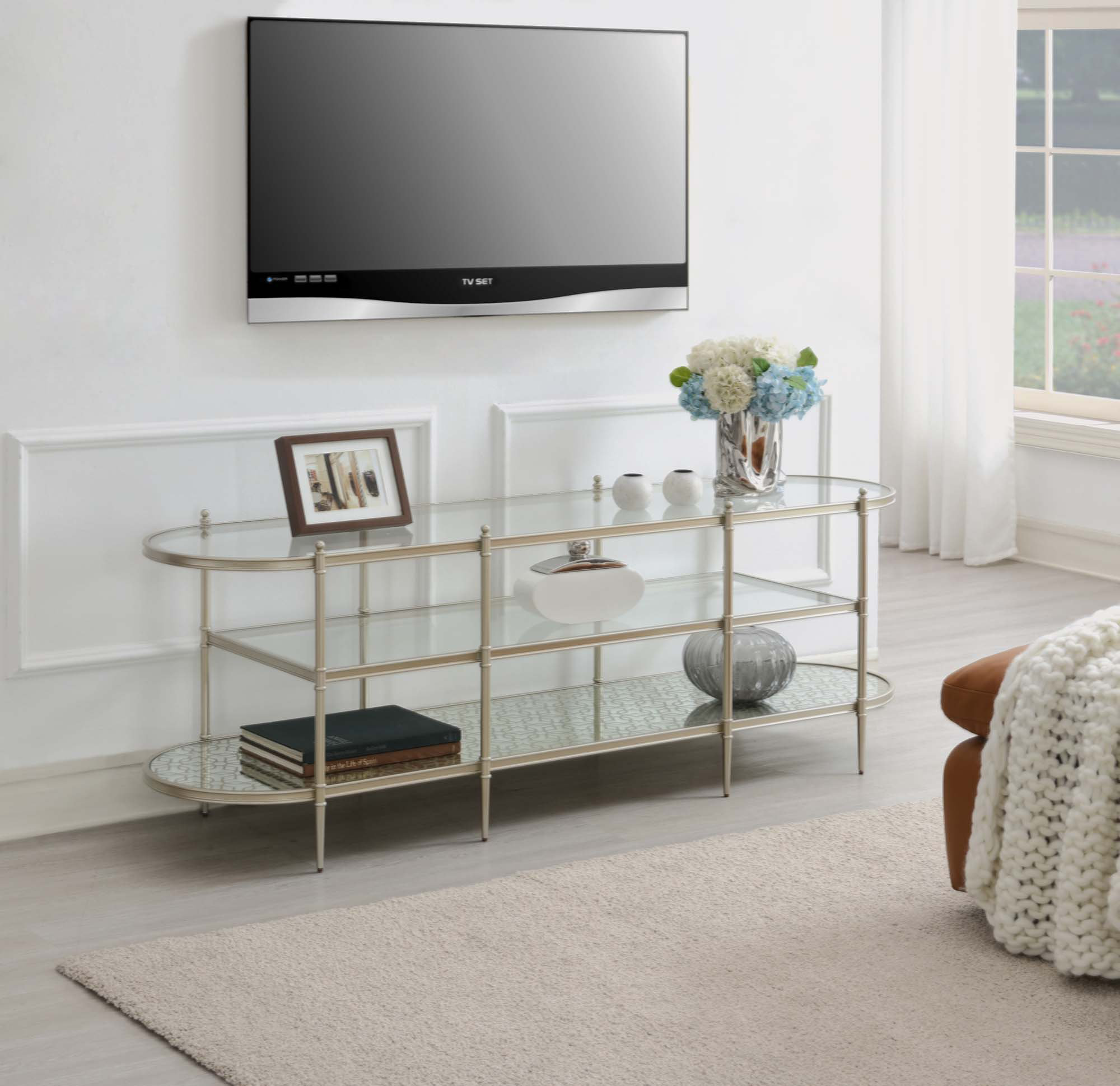 Everly Quinn Mayamiko Oval TV Stand in Clear & Champagne | Wayfair