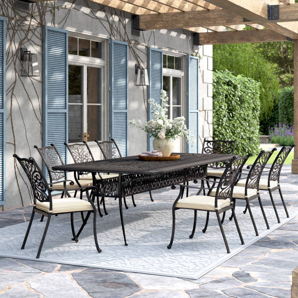 Bloomsbury Market Anae 11-Piece Patio Dining Set with Cushions and 46 x ...